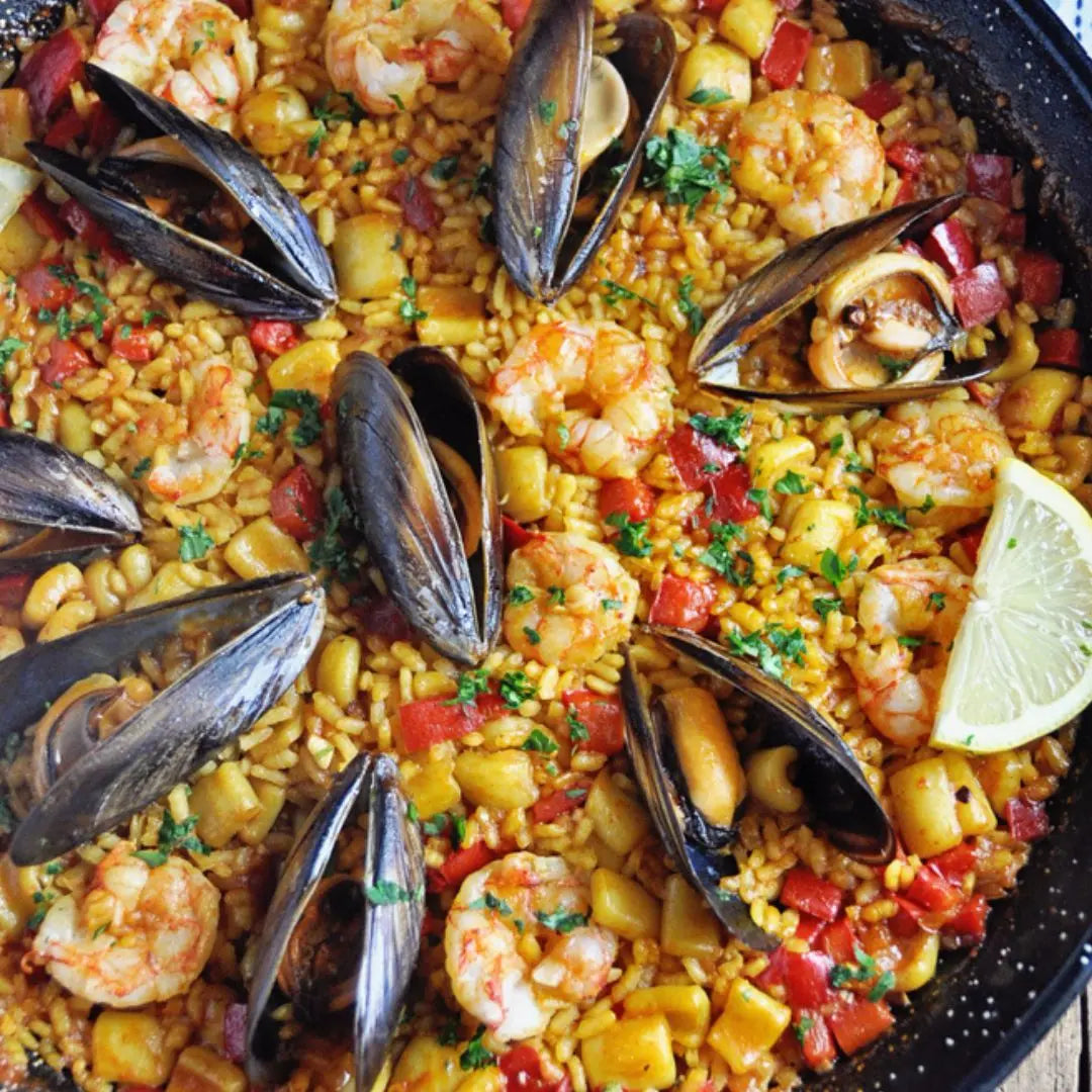 Classic Seafood Paella recipe with Perfect Socarrat - Petits Tresors